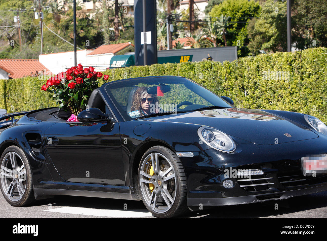 Steven Tyler seen driving in Los Angeles with a bouquet of flowers Los ...