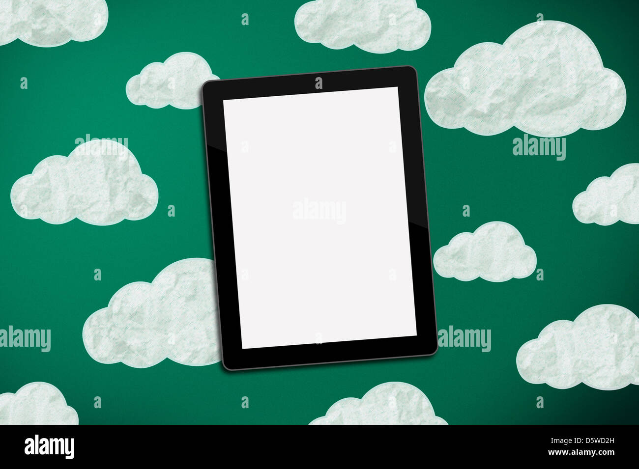 tablet on green chalk board with clouds Stock Photo - Alamy