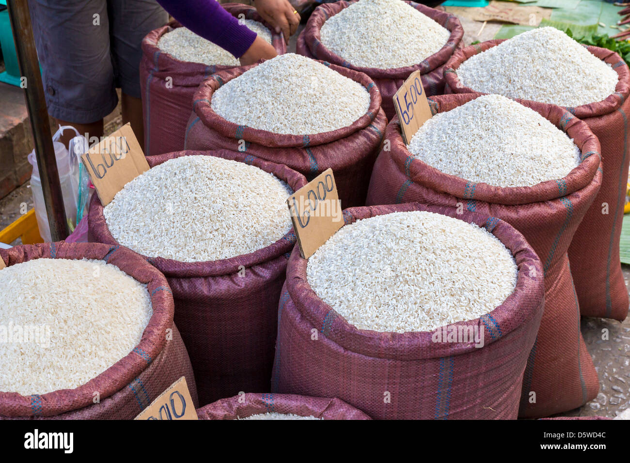 different types of rice presented at an asian market in Laos Stock ...