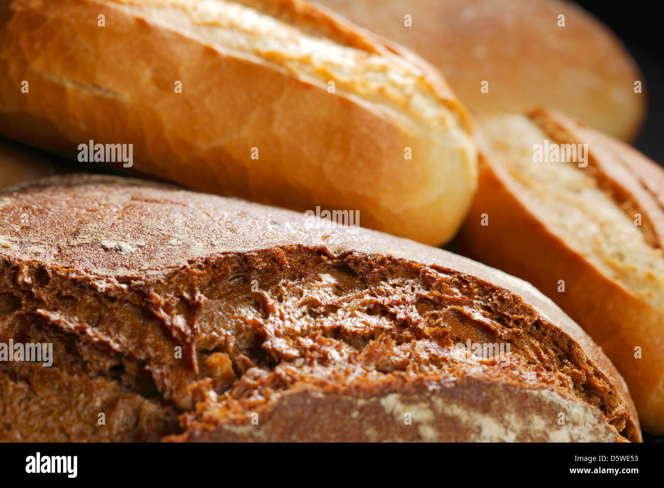 Various fresh bread background close-up Stock Photo - Alamy