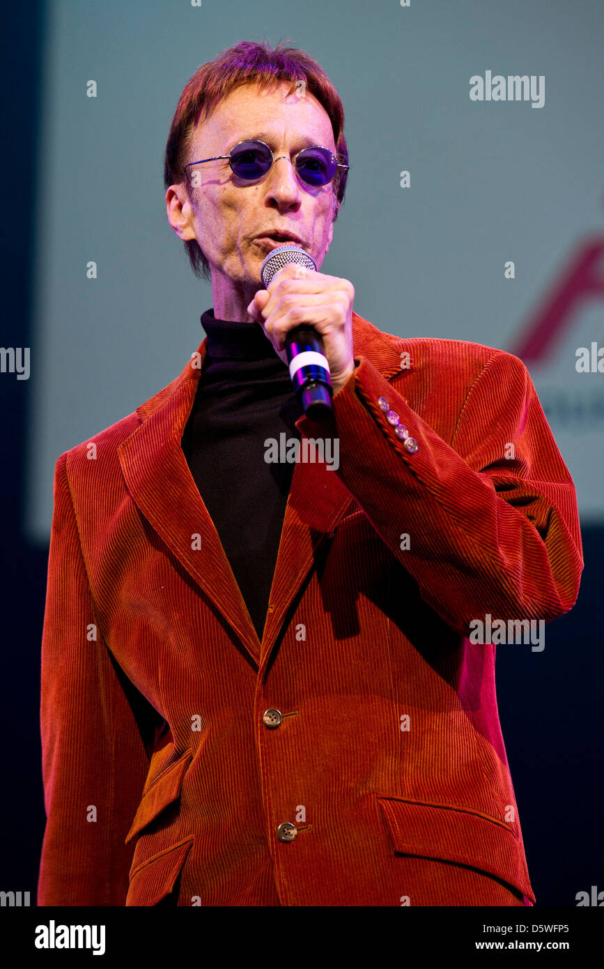Bee Gees singer Robin Gibb has awoken from a coma after more than a ...