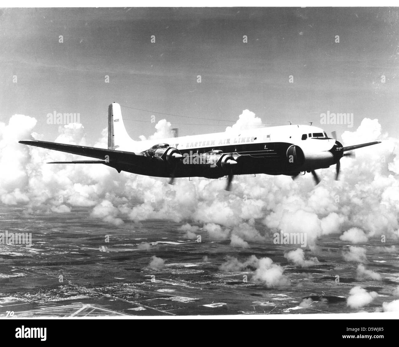 Eastern Airlines' Douglas DC-7B, registration N802D, flies over Chicago ...