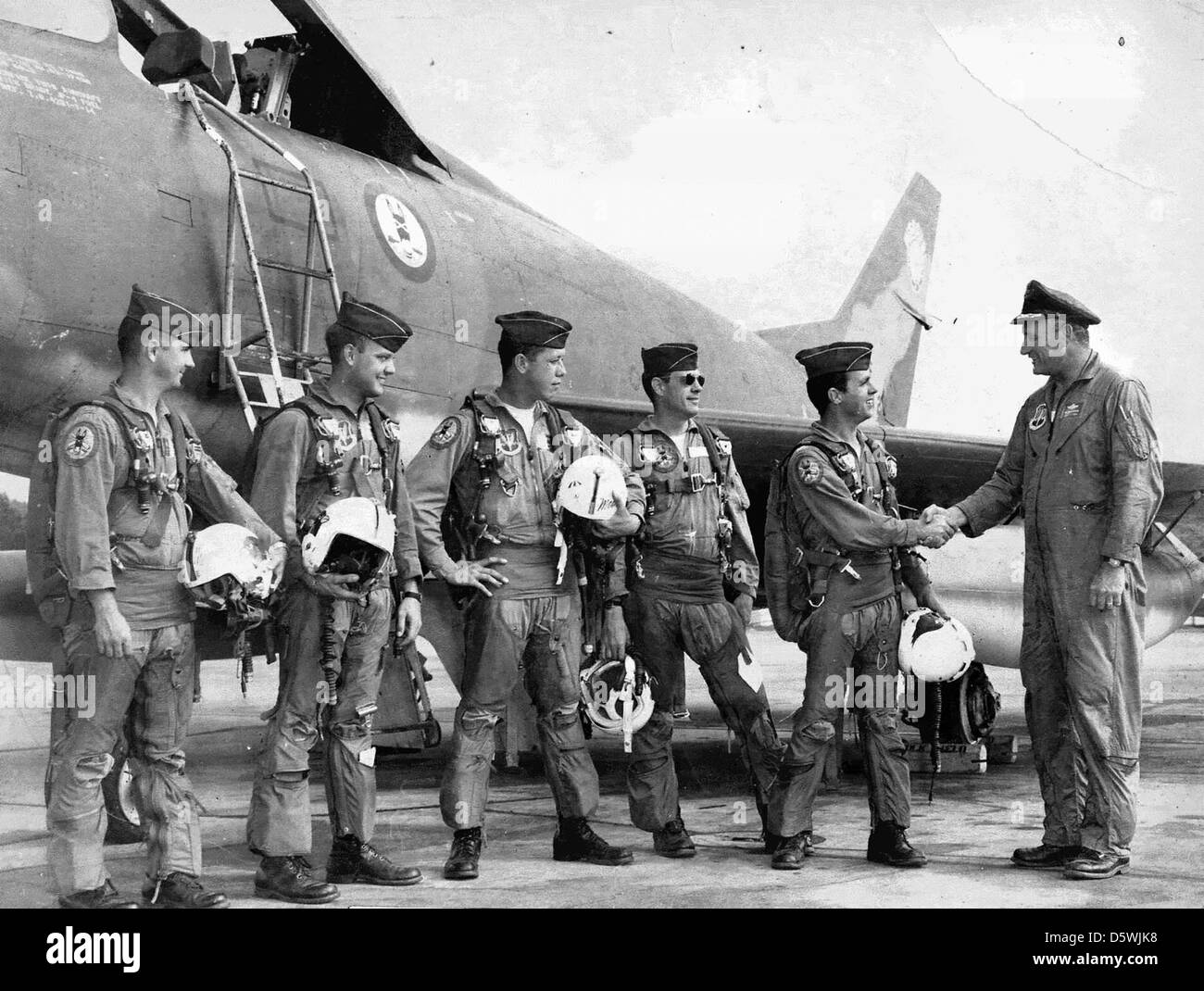 The North American F-100 Super Sabre, seen with pilots from the 110th ...