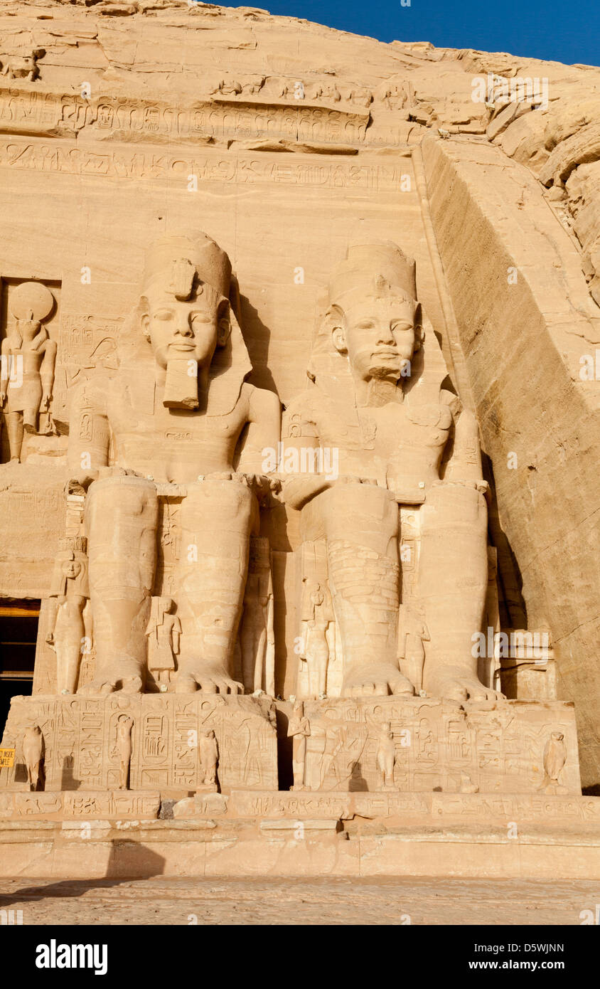 Two of the four statues of Pharaoh Ramesses II outside the Great Temple ...