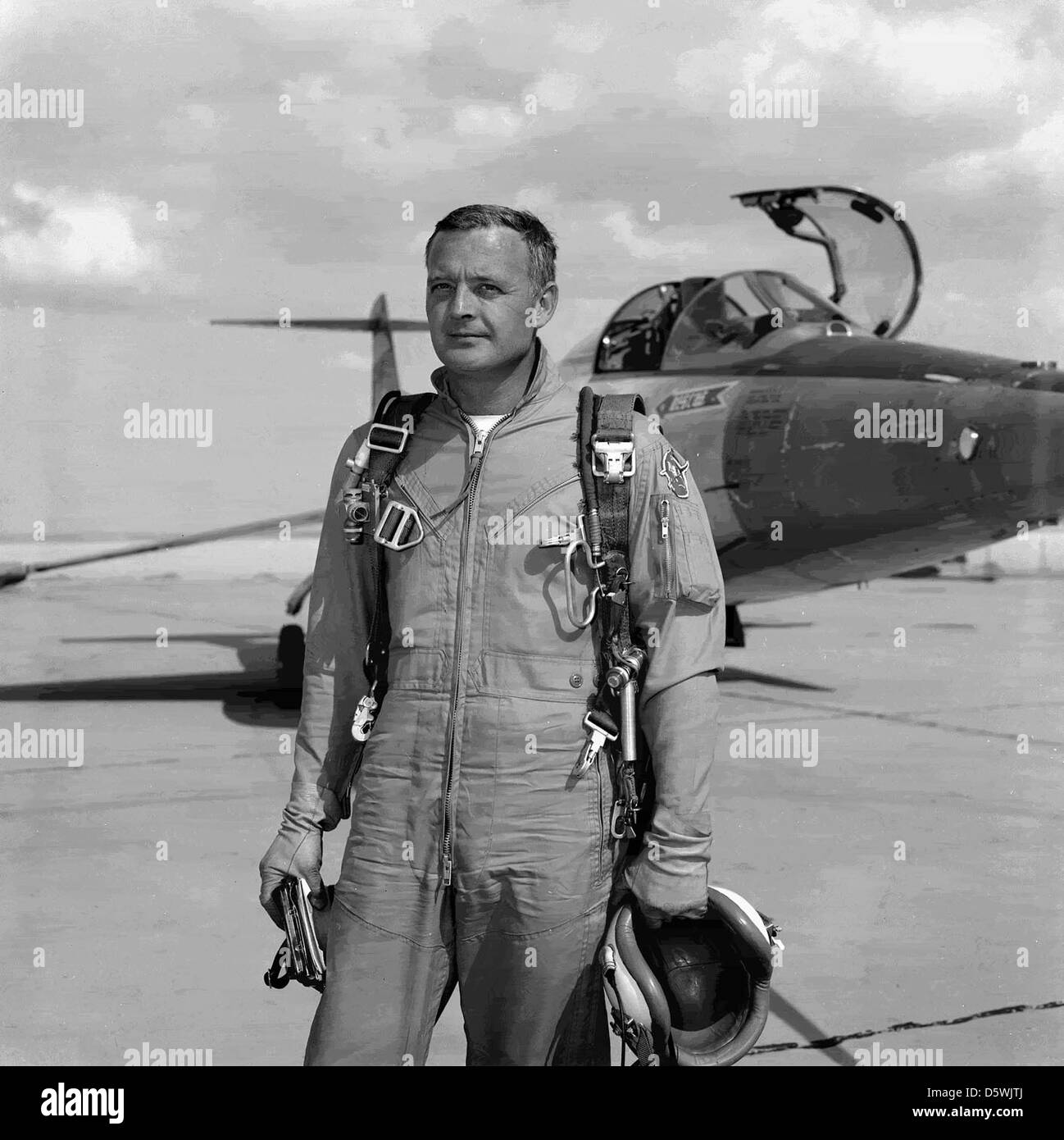 NASA research pilot Milton Milt Thompson is seen with a Lockheed F-104 ...
