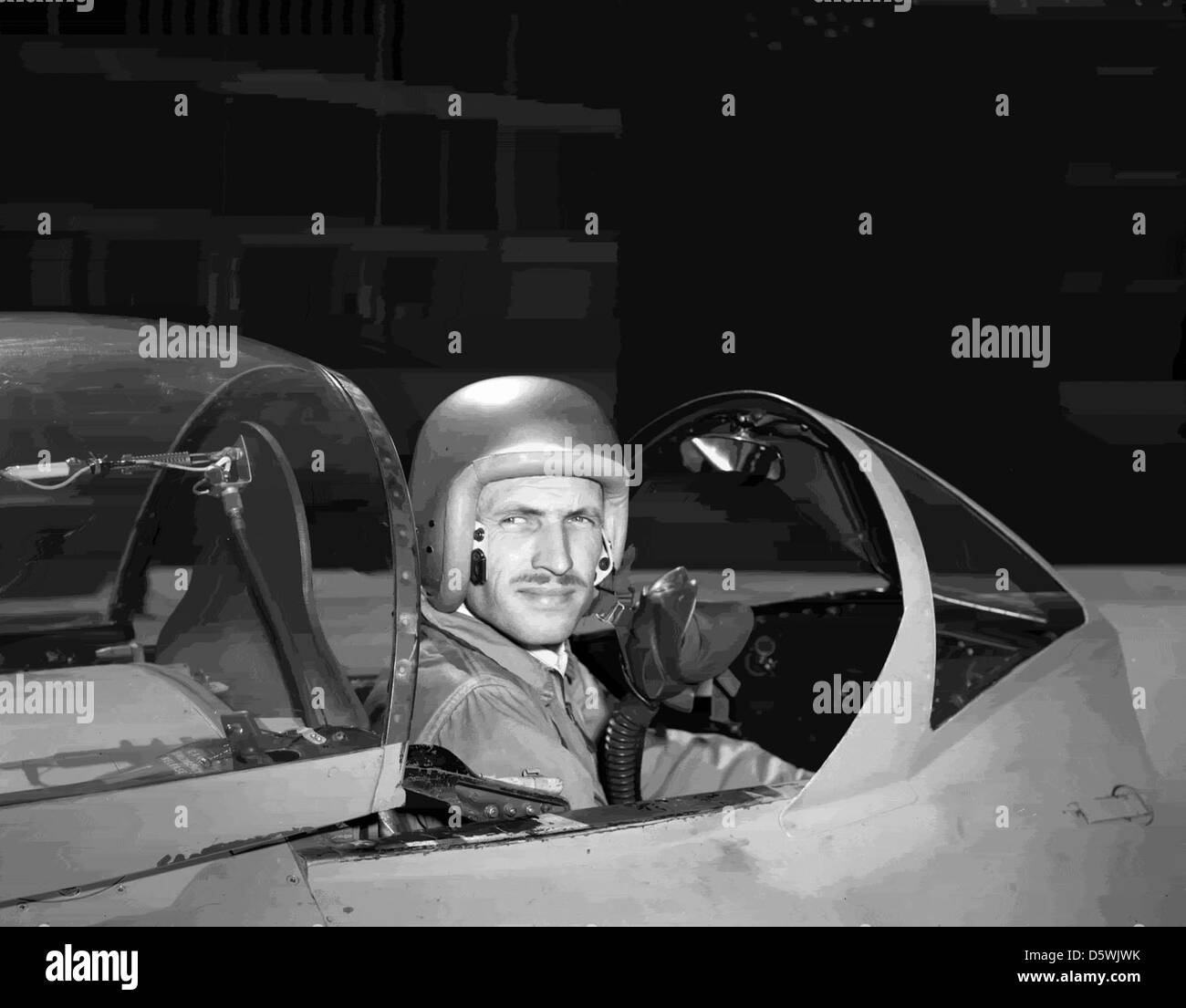 In 1949, NACA test pilot George E. Cooper is seen with the Lockheed F ...