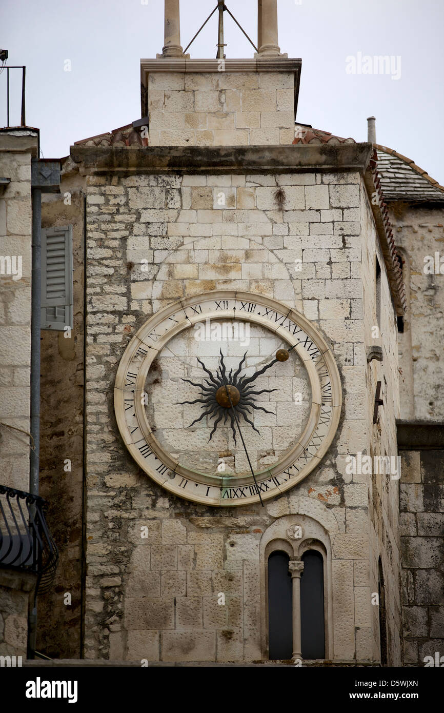 Clocktower with medieval sundial Iron Gate in the Peoples Square ...