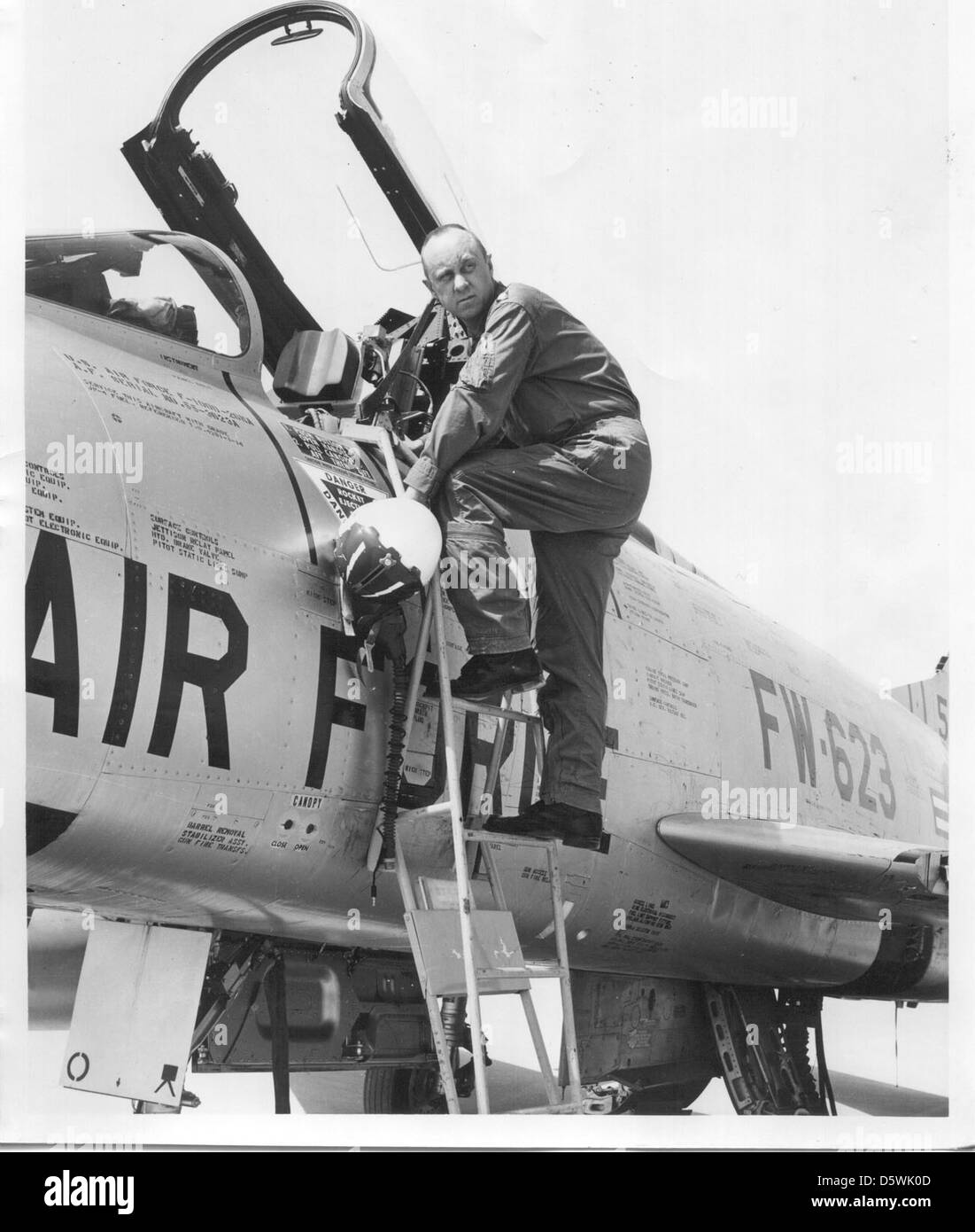 Lt. Col. Harold E. Comstock is seen aboard the North American F-100D-26 ...