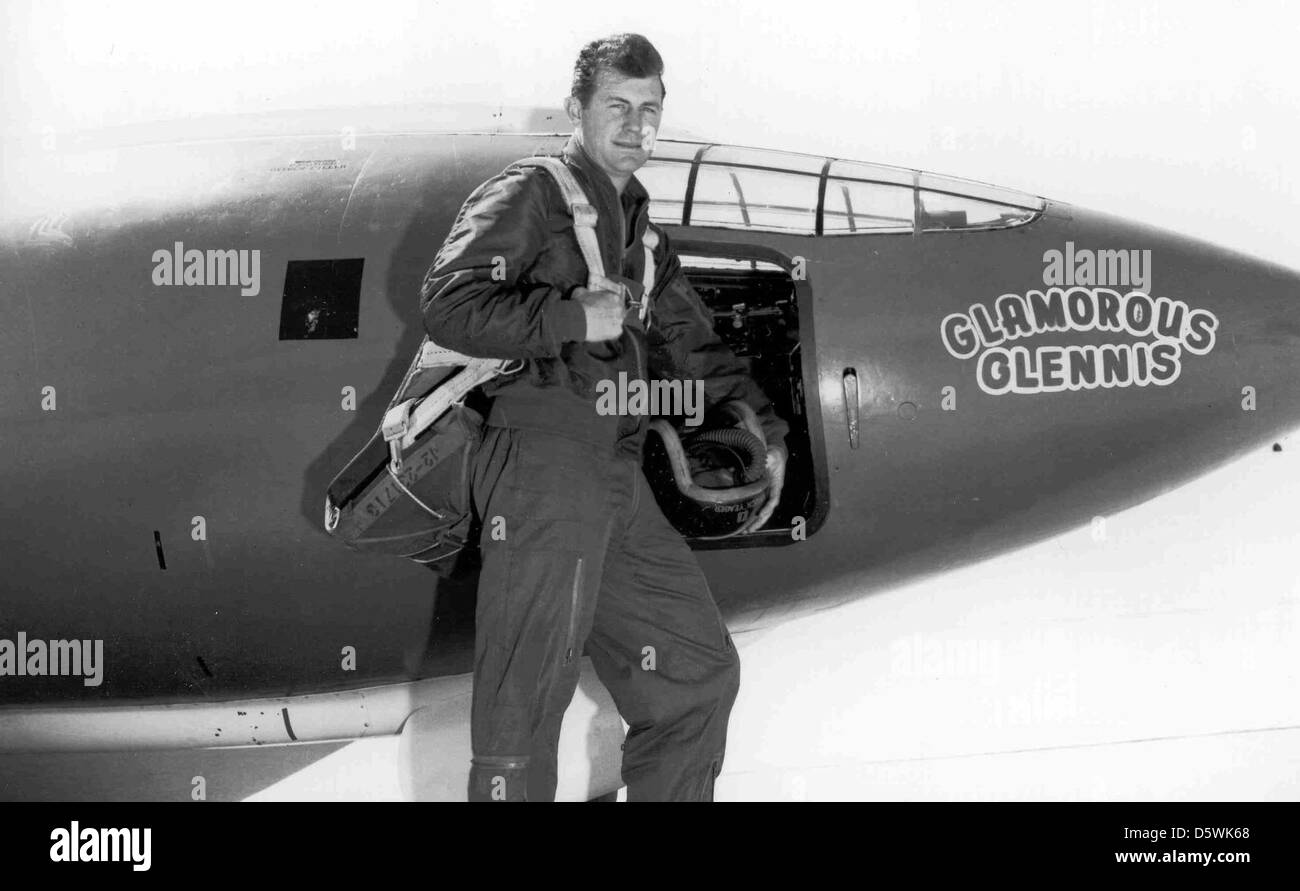 Test pilot Charles 'Chuck' Yeager stands next to the Bell X-1 Skyrocket ...