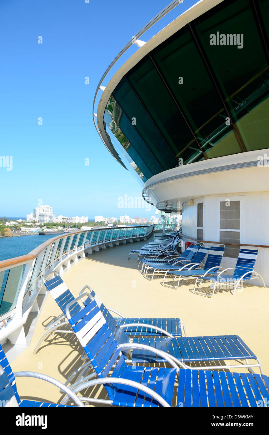 Side view of cruise ship deck and lounge chairs in San Juan Stock Photo ...