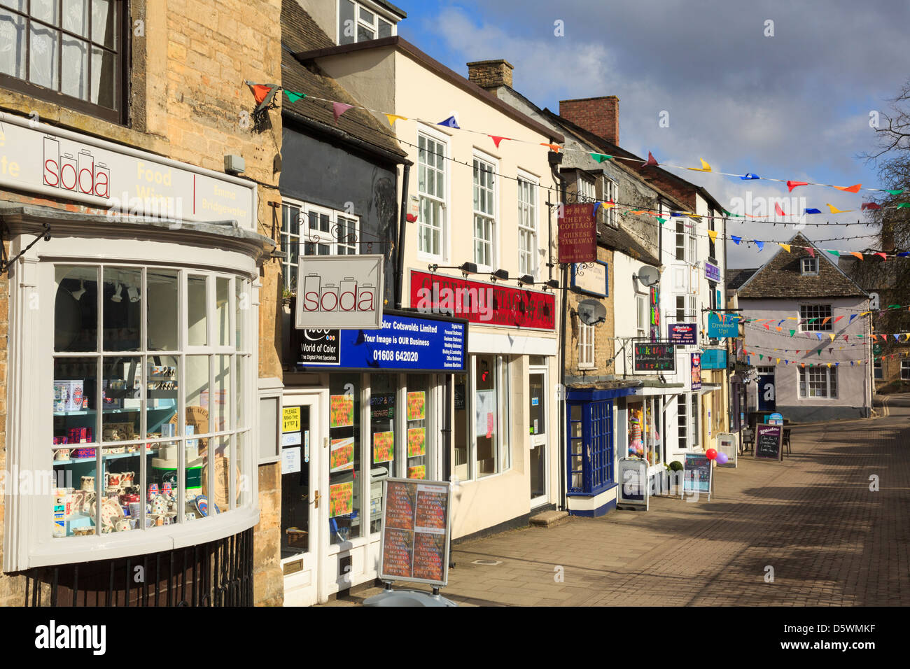 Quaint old shops in the old Cotswold town centre in Chipping Norton ...