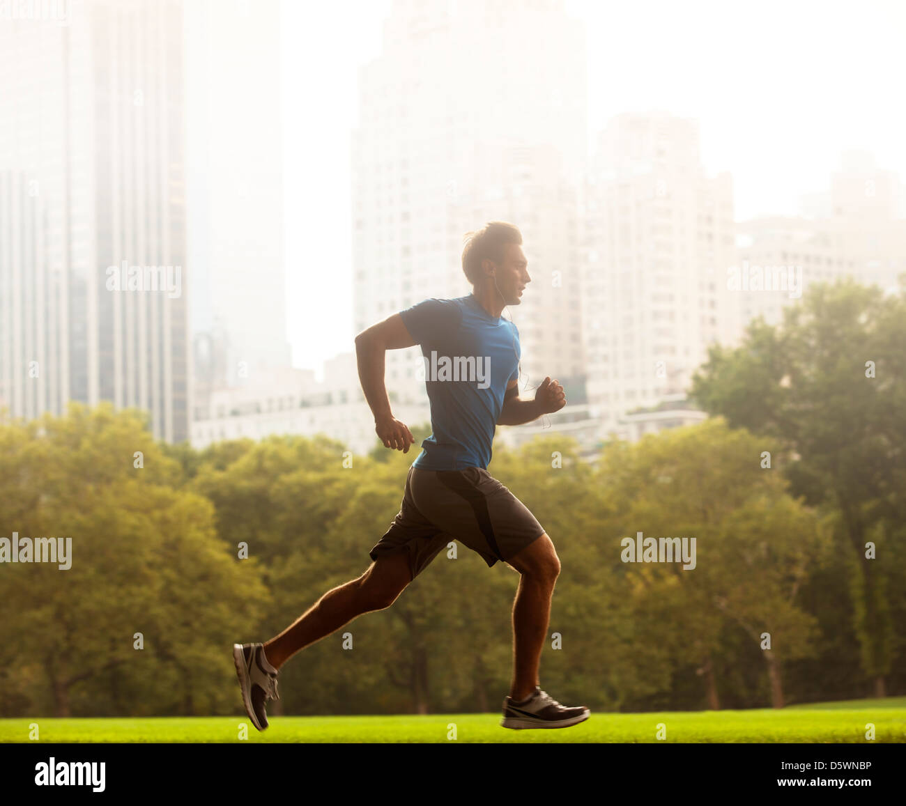 Man jogging outside park central hi-res stock photography and images ...