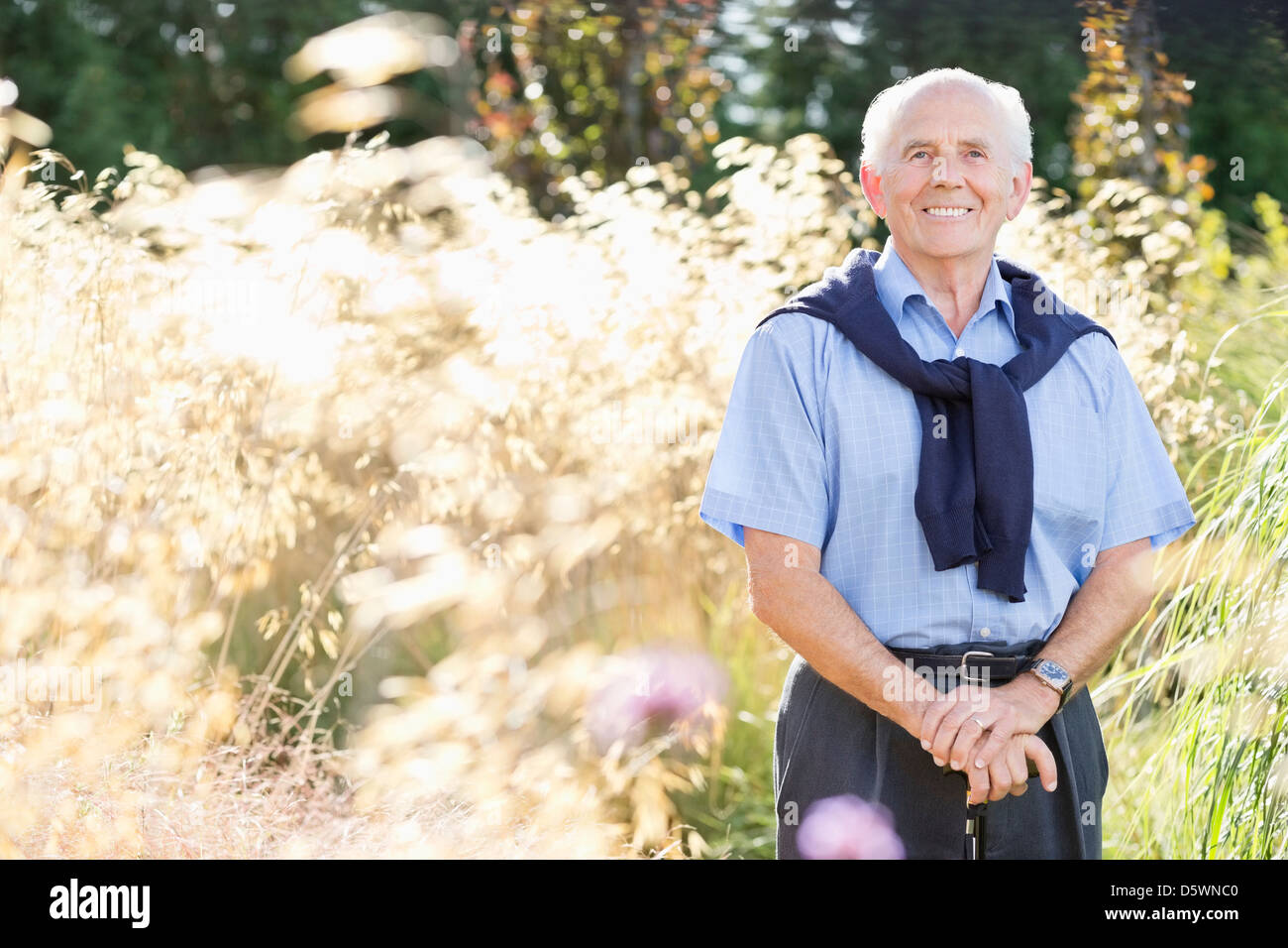 Old man standing outside hi-res stock photography and images - Alamy