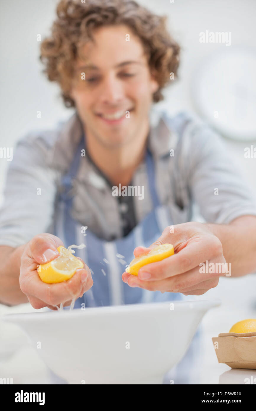 Squeezing clothes hi-res stock photography and images - Alamy