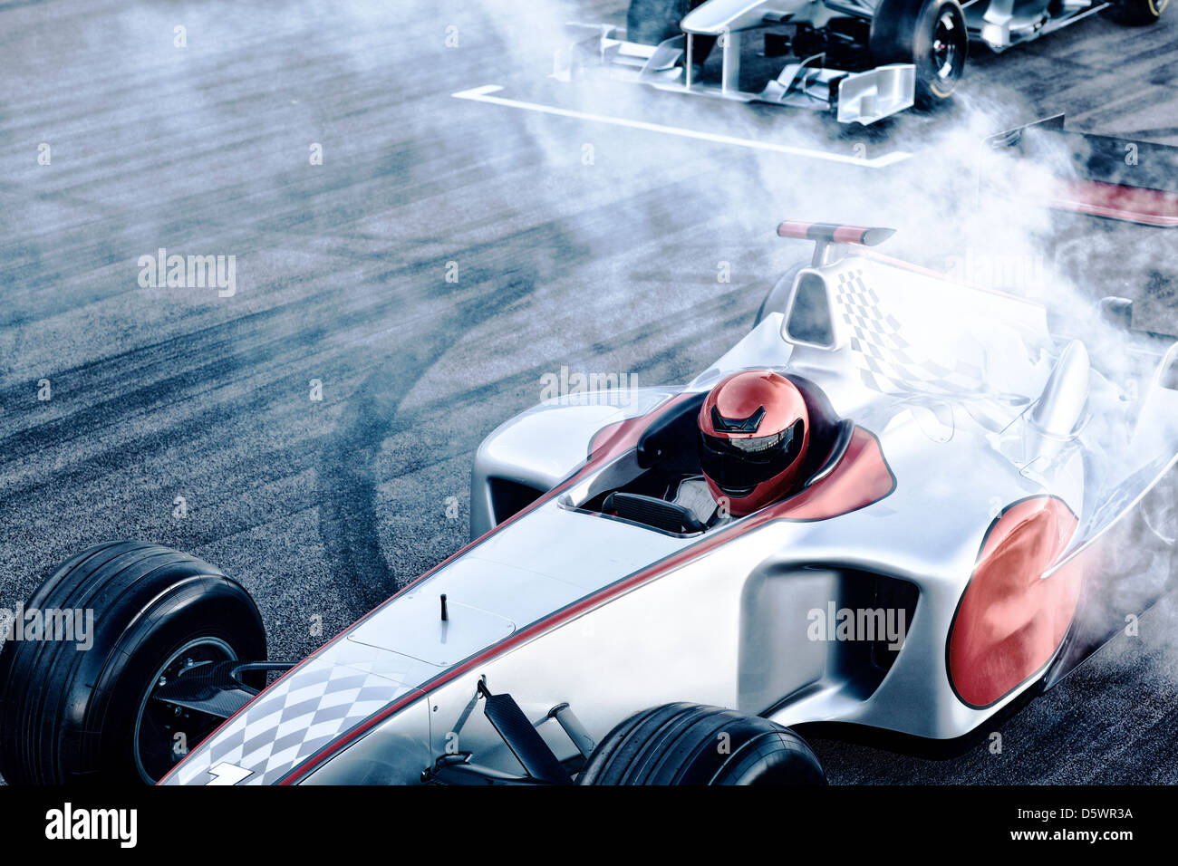 Race cars driving on track Stock Photo - Alamy