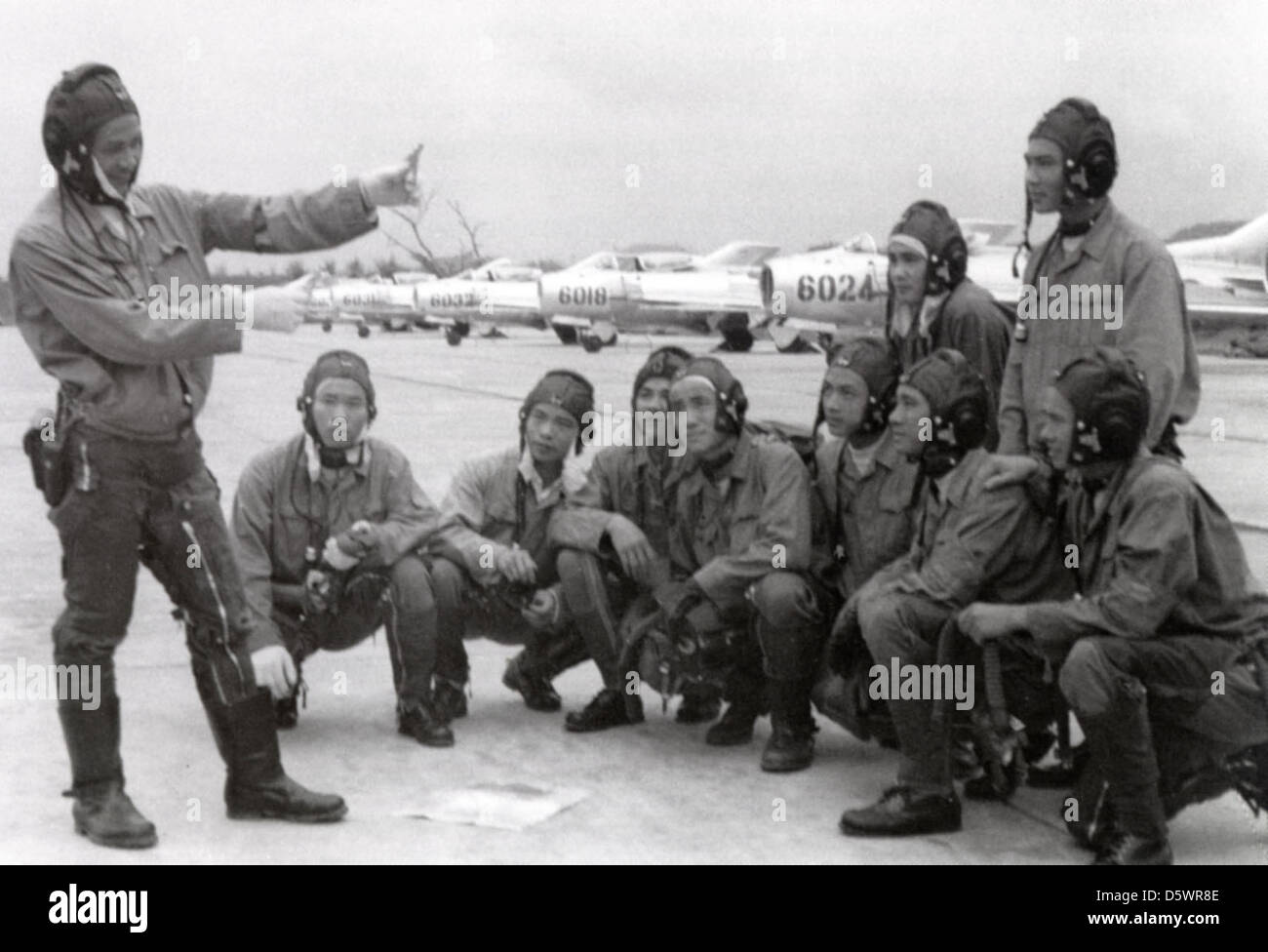 VPAF pilots discuss tactics on their flightline with Shenyang J-6 ...