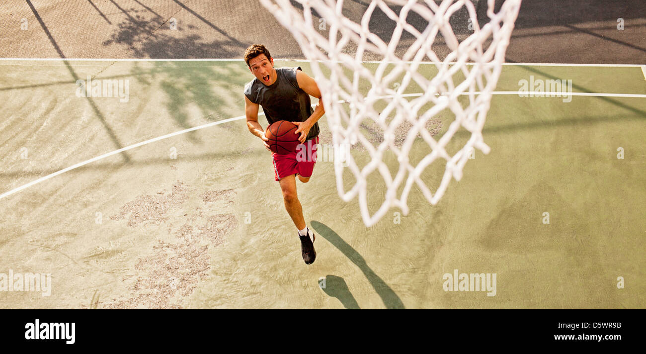 Man running basketball hi-res stock photography and images - Alamy