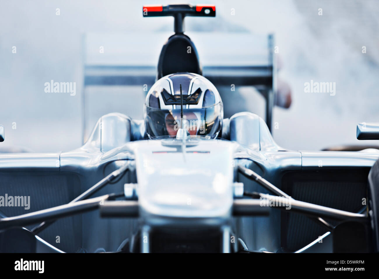 Race car driving on track Stock Photo - Alamy