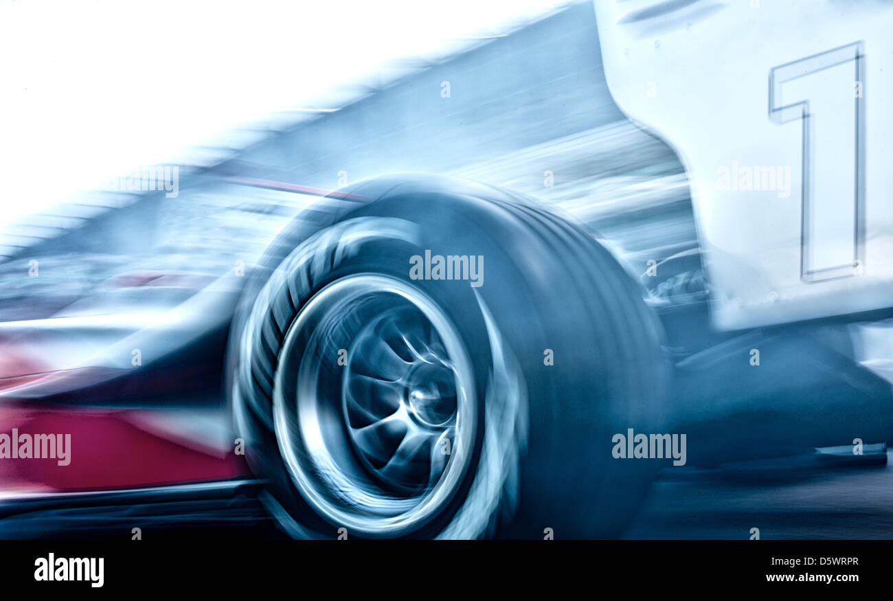 Race car driving on track Stock Photo - Alamy