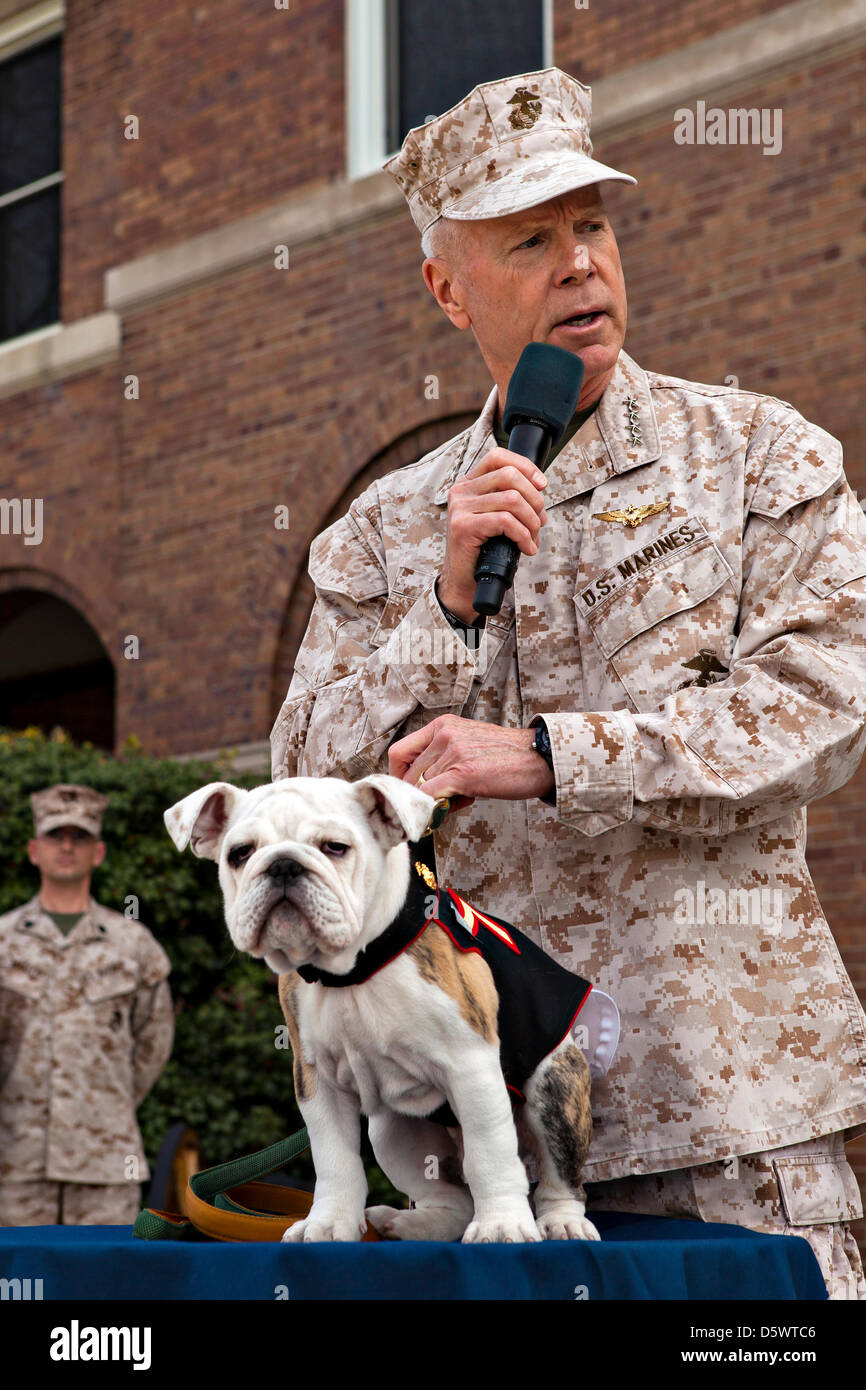 Commandant of the Marine Corps Gen. James F. Amos presents puppy Pfc ...