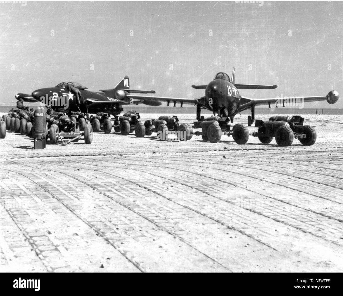 USMC Grumman F9F-2 "Panthers" in Korea with bombs on carts Stock Photo ...