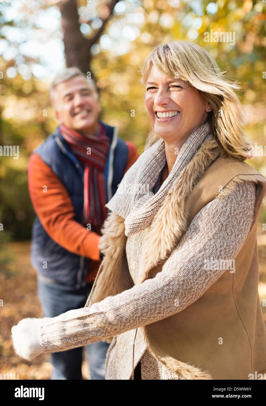 Older couple walking together hi-res stock photography and images - Alamy
