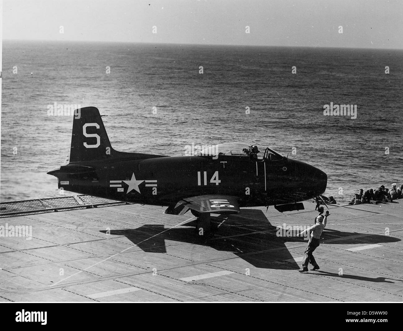 An FJ-1 'Fury' from VF-5A is stationed on the flight deck of the USS ...