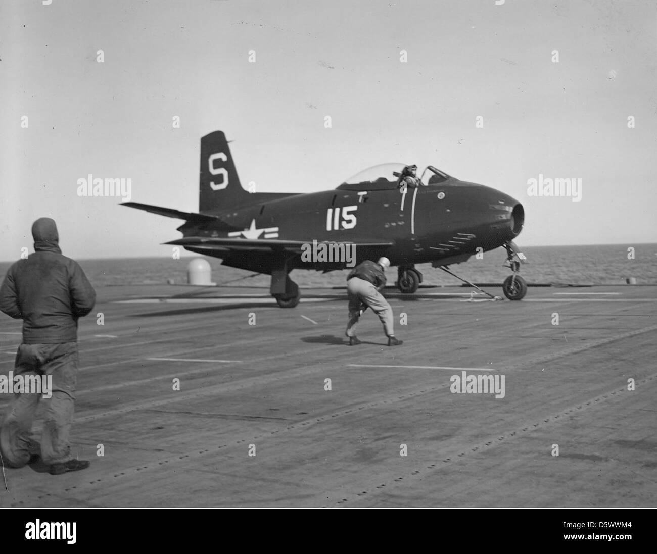 An FJ-1 North American 'Fury' from VF-5A lands on the flight deck of ...