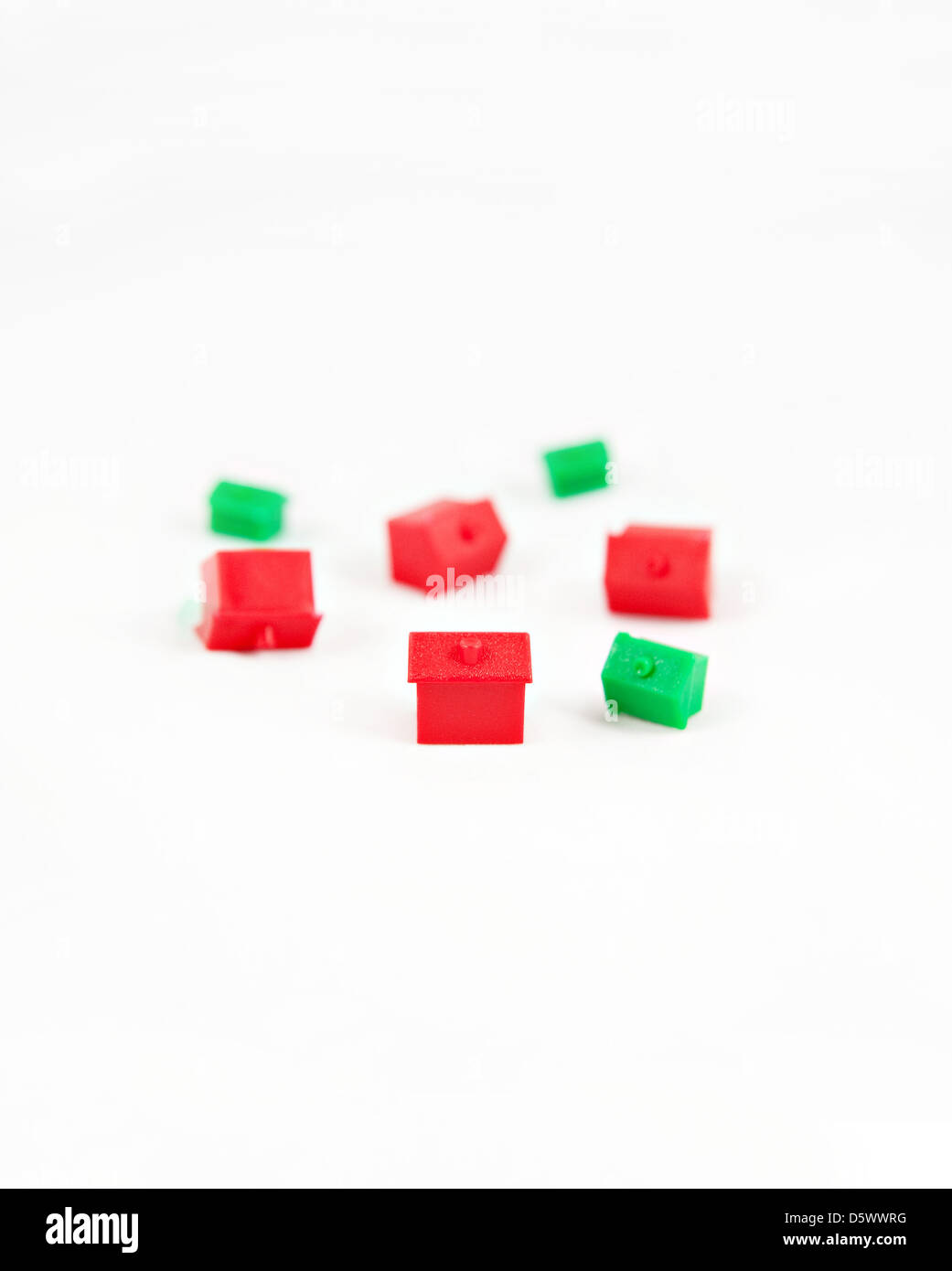 A selection of Monopoly houses and hotels on white background Stock ...