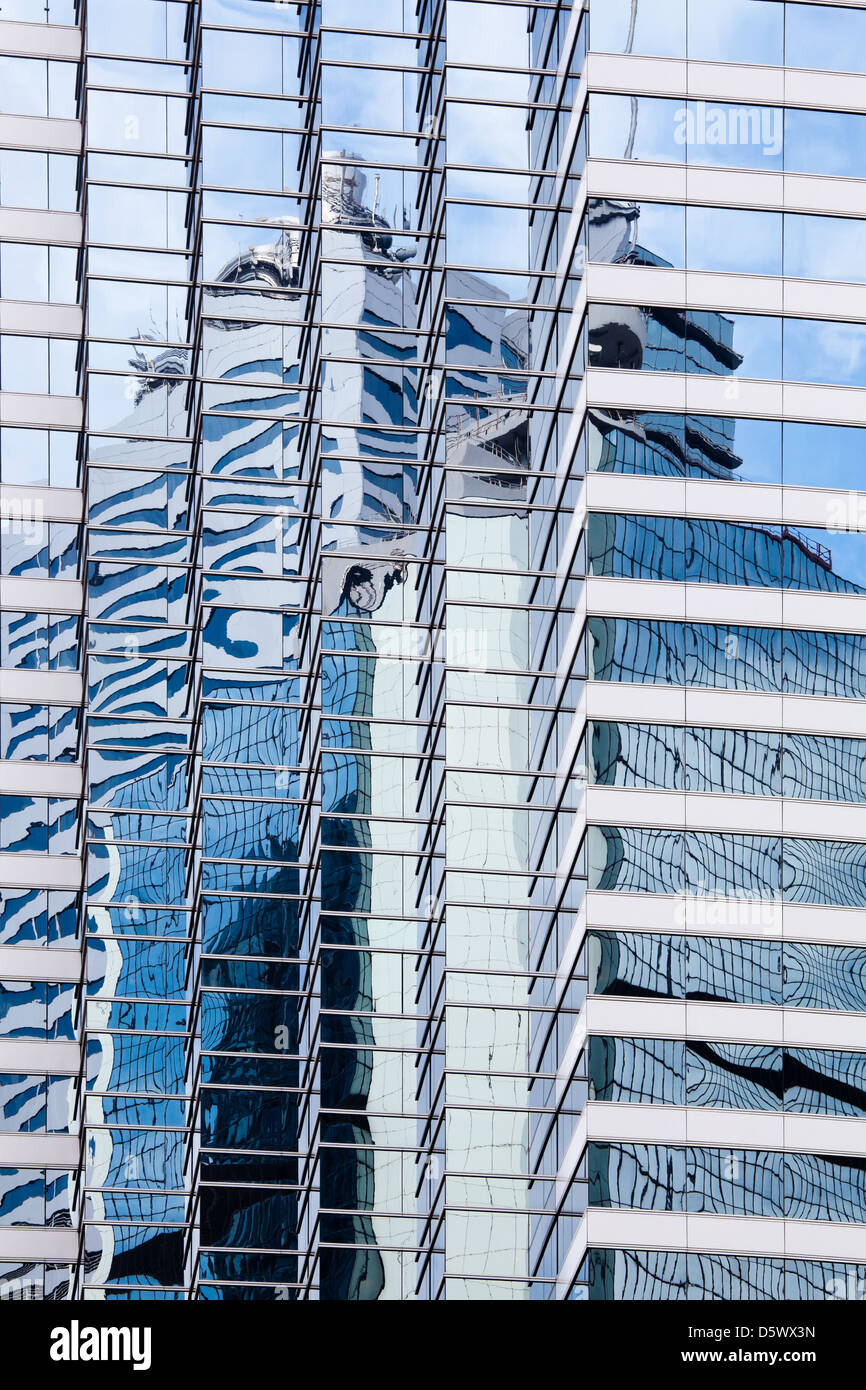 Reflections in glass metal facade skyscraper hi-res stock photography ...