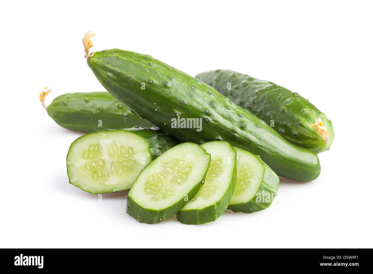 cucumber cut group on white background Stock Photo - Alamy