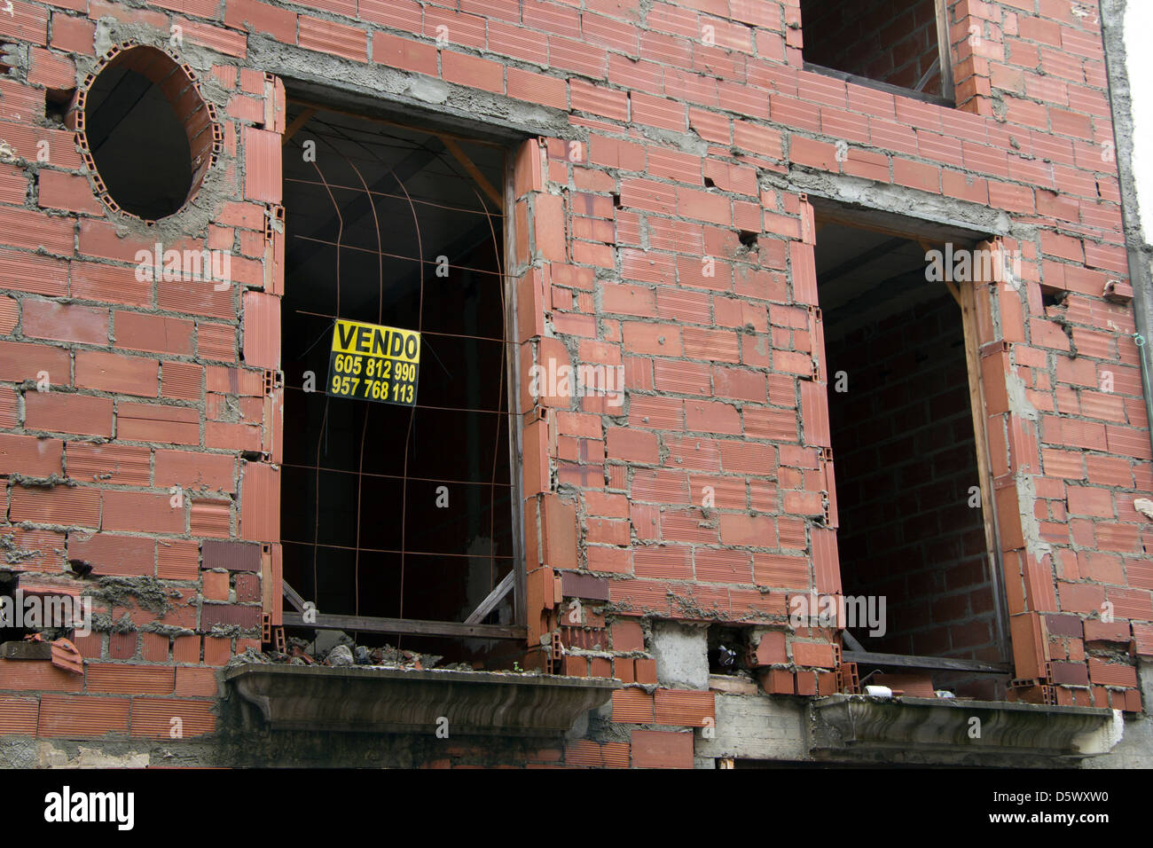 Abandoned building project being sold unfinished during property crash ...
