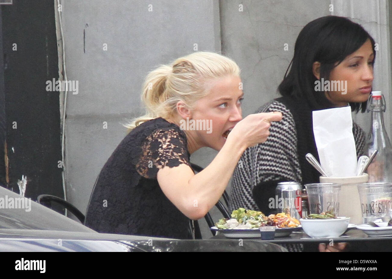 Amber Heard having lunch with a friend at Joan's on Third in West ...