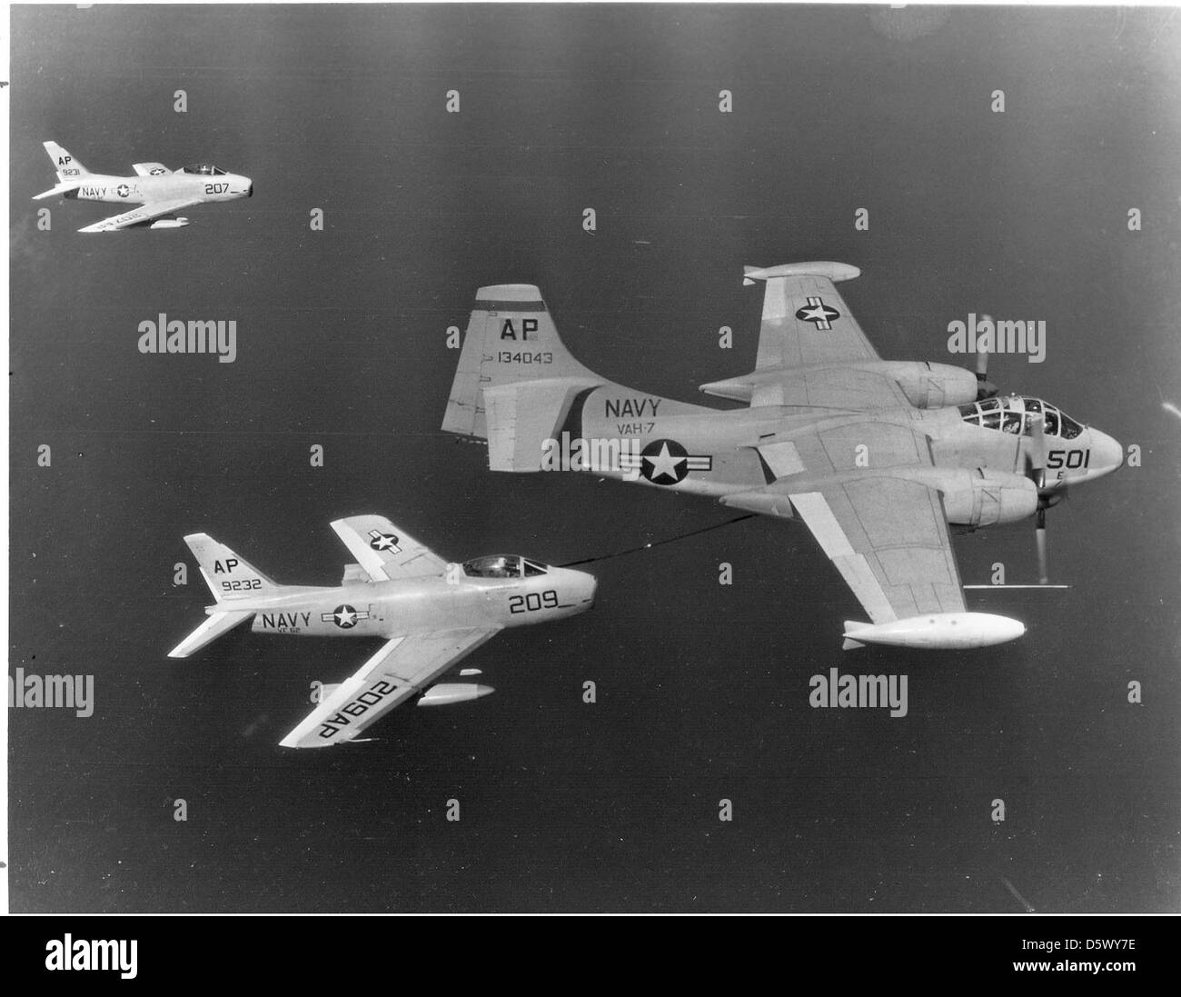 North American FJ-3M Furys of VF-62 are refueling in flight from an AJ ...