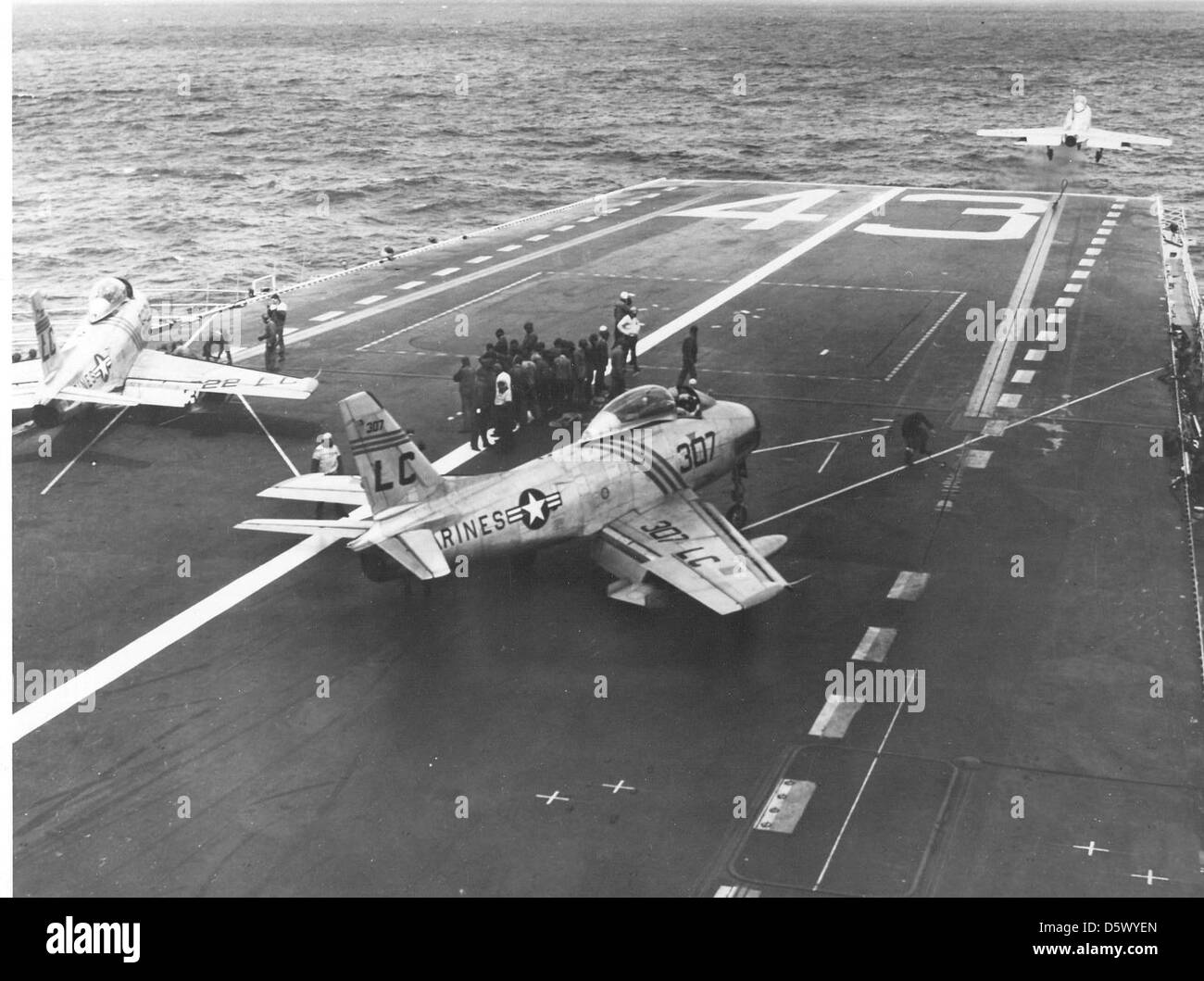 The North American FJ-2 Fury, from VMF-122, is ready to launch from the ...
