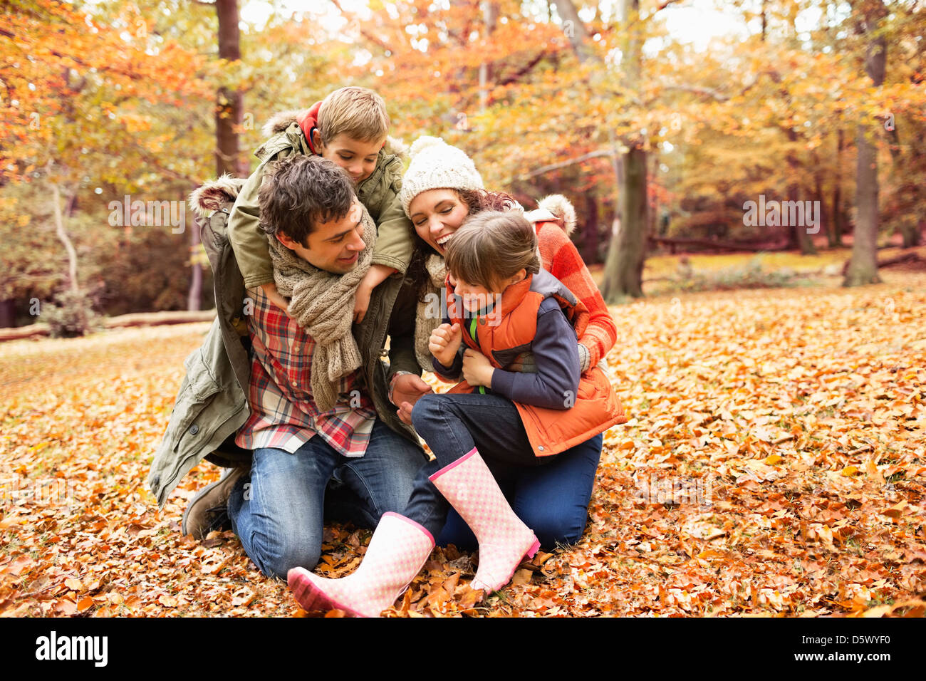 Family playing together in park Stock Photo - Alamy