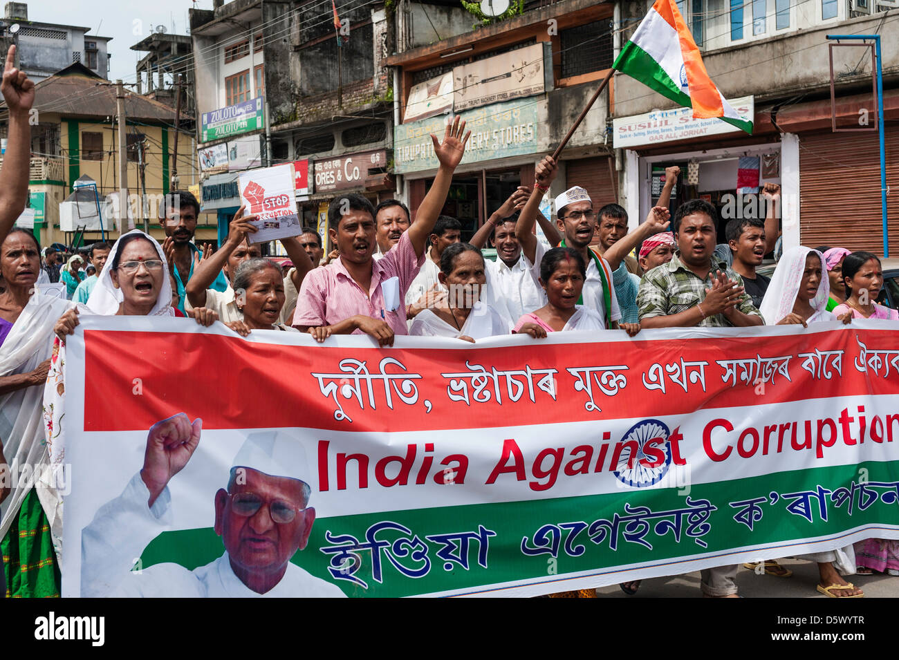 People with large banner and Indian flag demonstrate in favour of ...