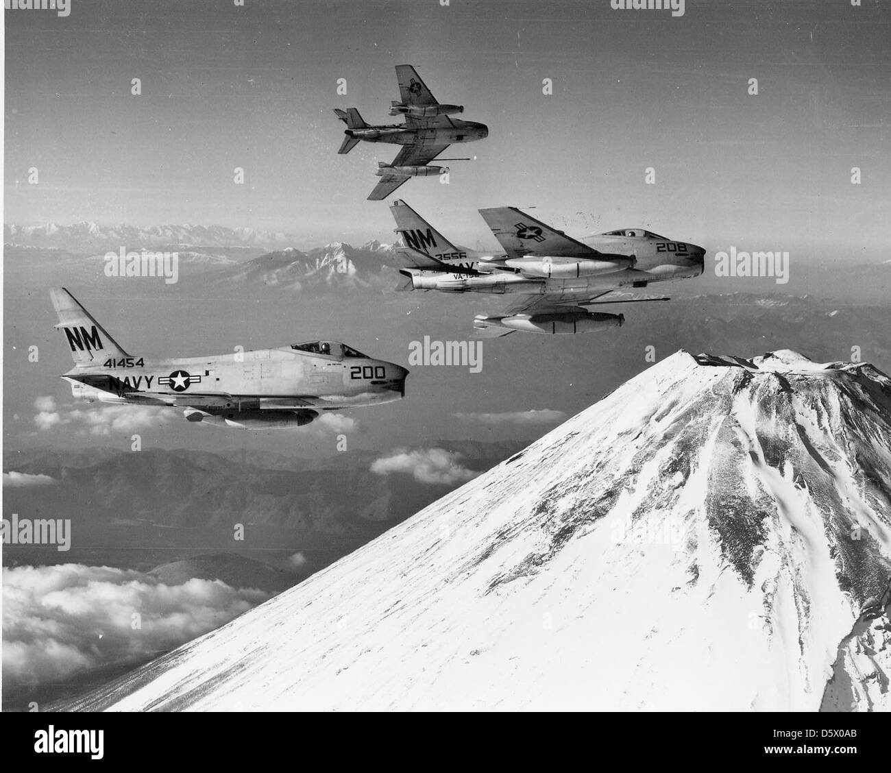 American FJ-4B Fury fighter aircraft from VA-192 flying over Mt. Fuji ...