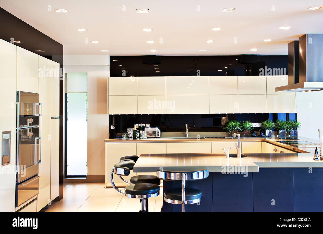 Counters and table in modern kitchen Stock Photo - Alamy