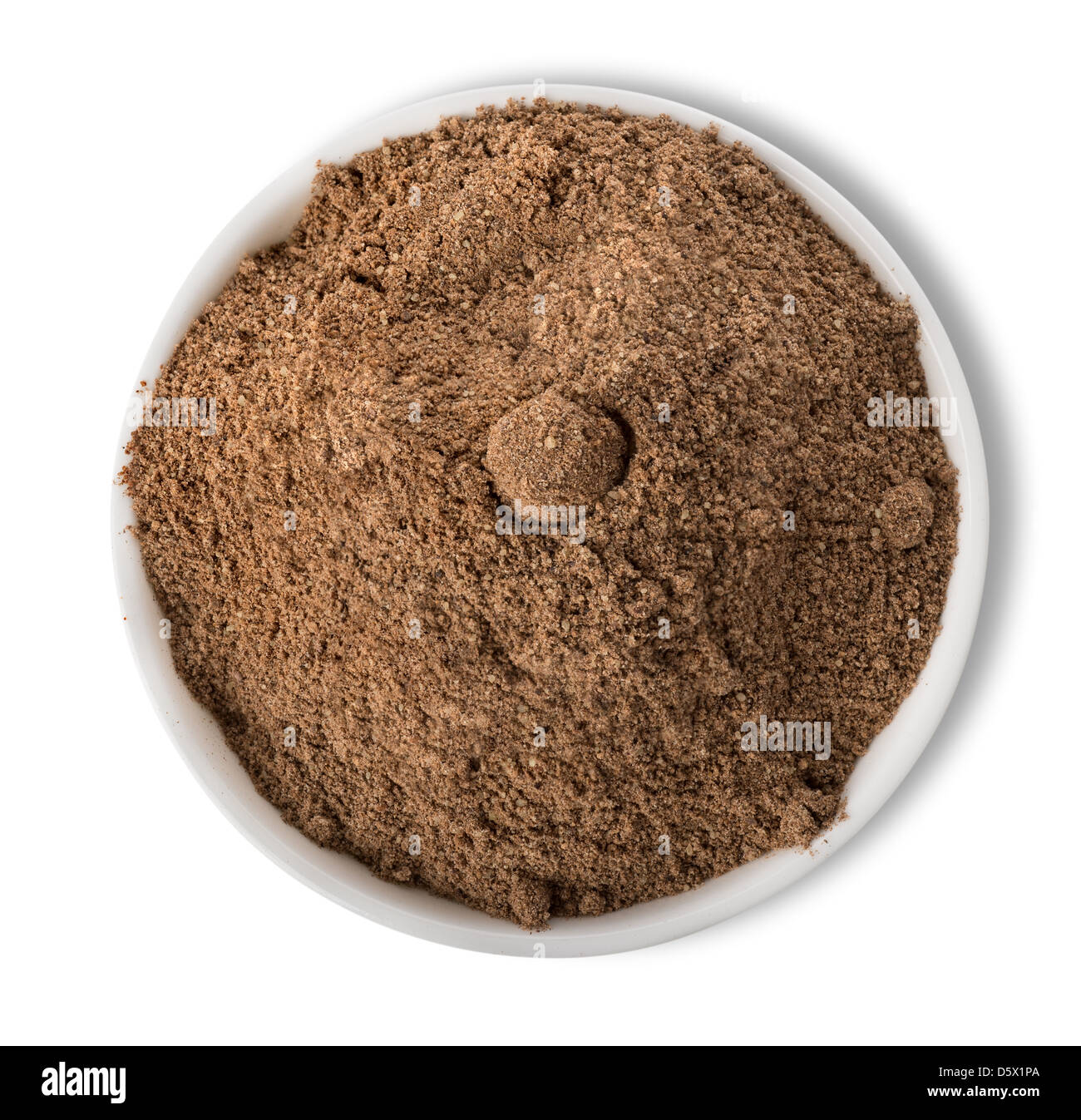 Ground pepper in plate isolated on white background Stock Photo - Alamy