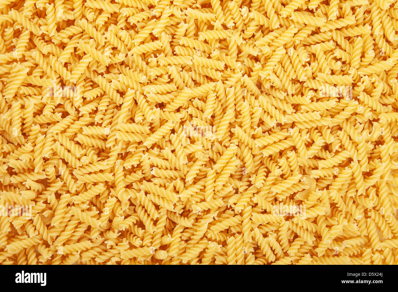Pasta texture background. Pasta is a staple food of traditional Italian ...