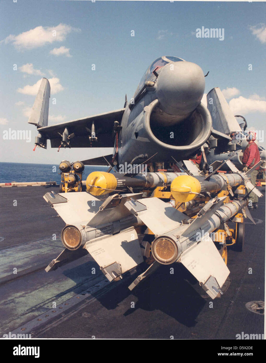 An LTV A-7E Corsair II of VA-72 is being prepared for combat strikes on ...