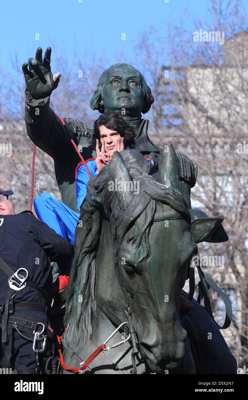 A man dressed in a Superman costume protests against social ...