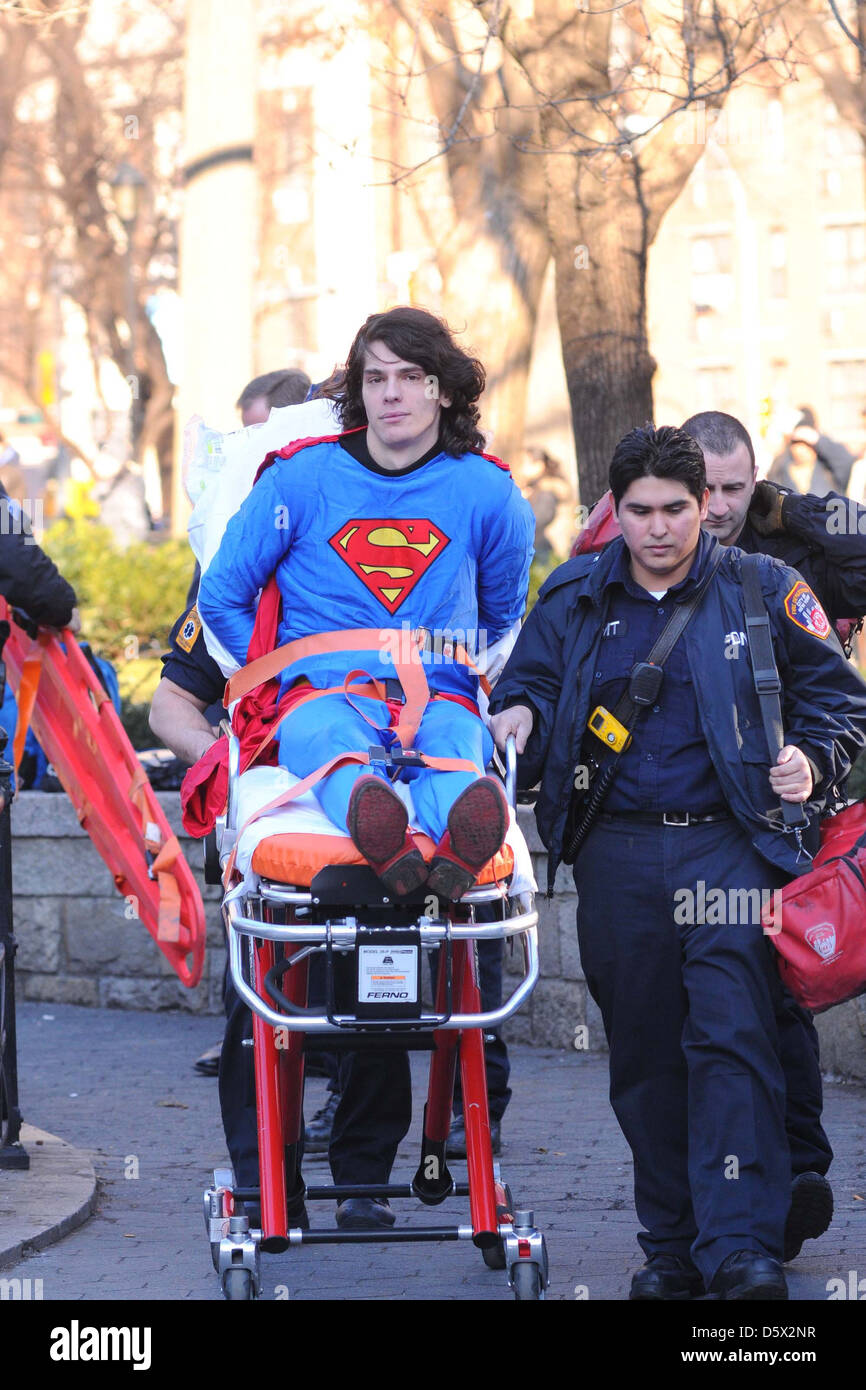 A man dressed in a Superman costume protests against social ...