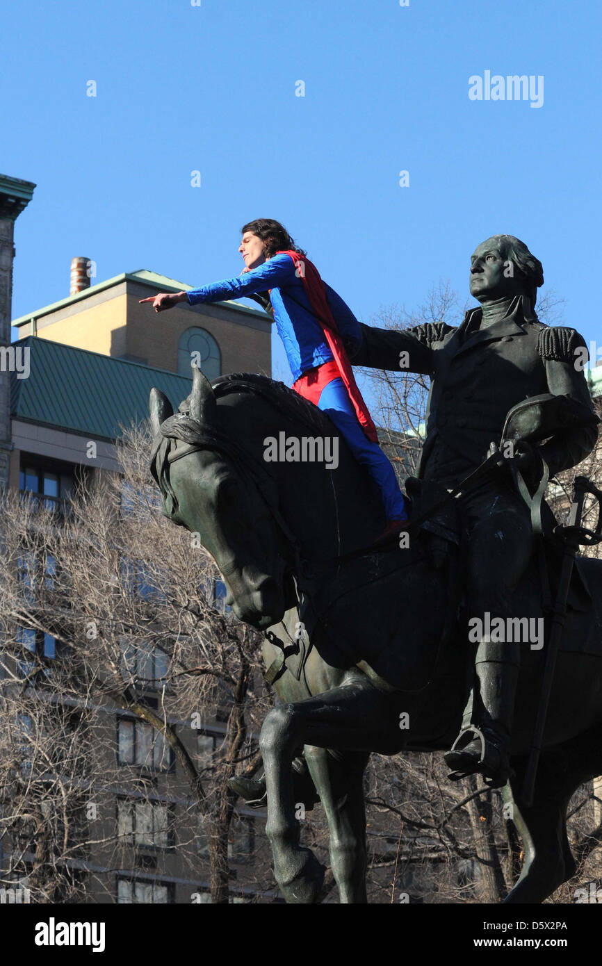 A man dressed in a Superman costume protests against social ...