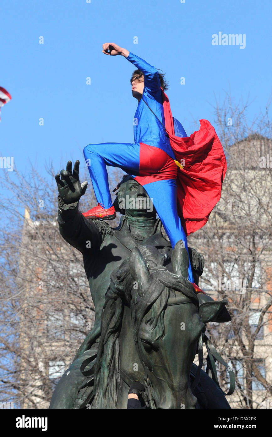 A man dressed in a Superman costume protests against social ...