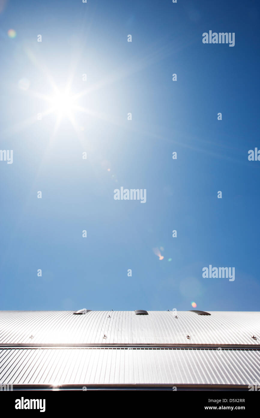 Roof of modern building and blue sky Stock Photo - Alamy