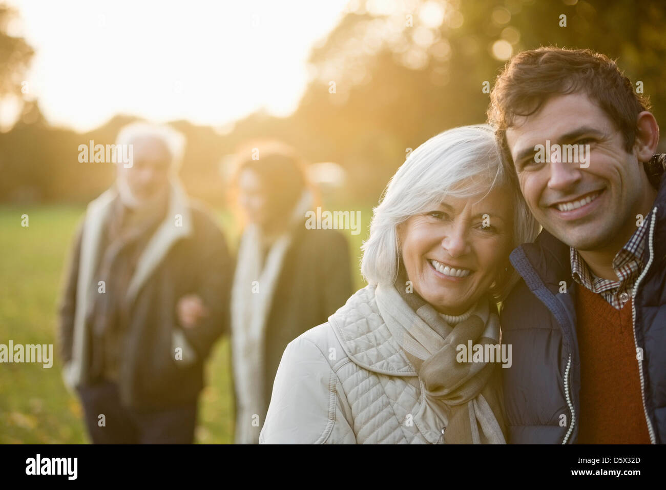Family walking together in park Stock Photo - Alamy