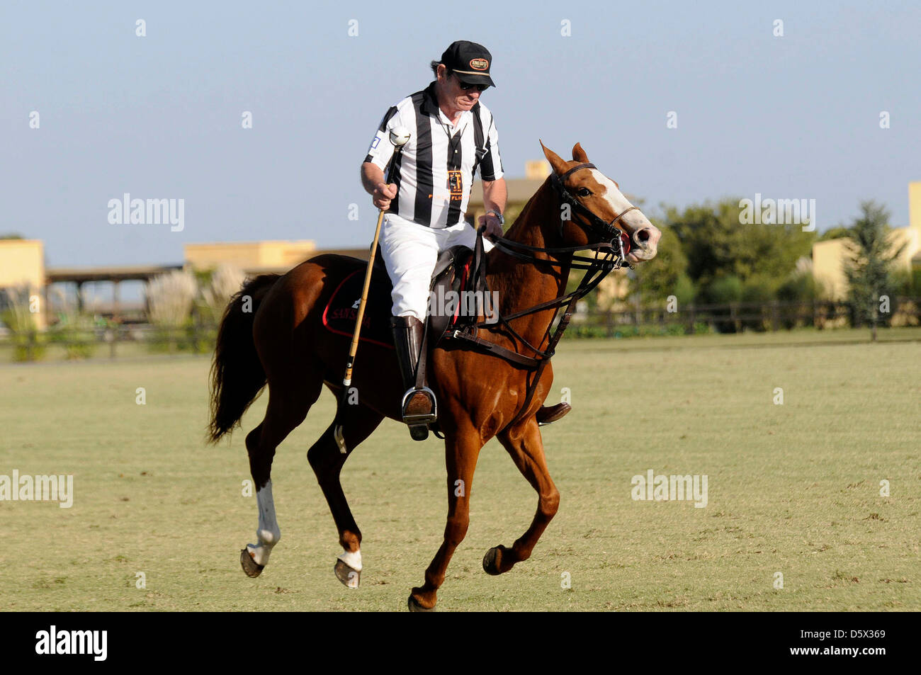 Tommy Lee Jones participates in a charity polo match as a referee, held ...