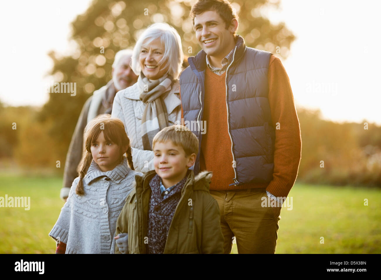 Family walking together in park Stock Photo - Alamy